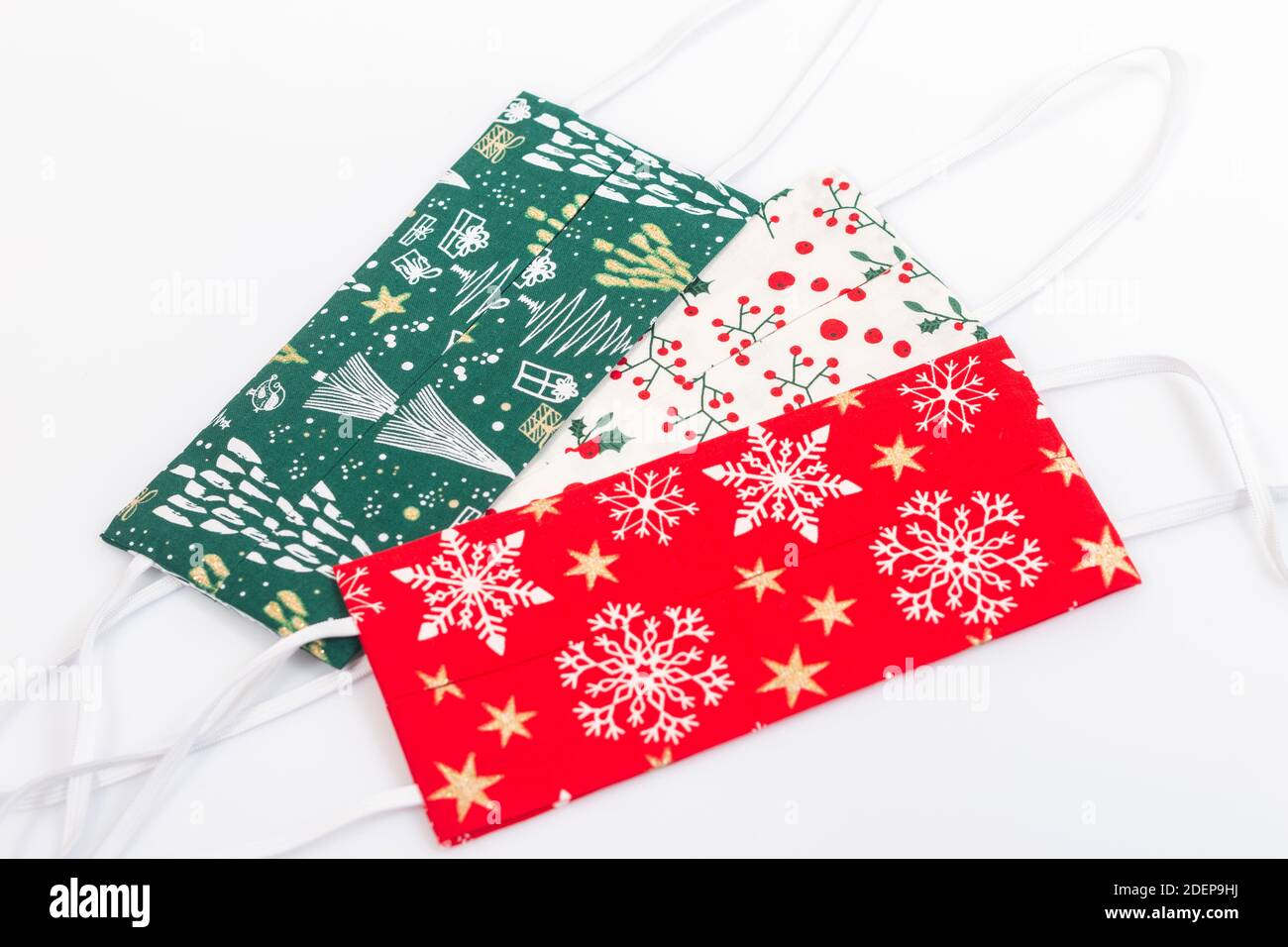 christmas handmade colorful face masks isolated on a white background ...