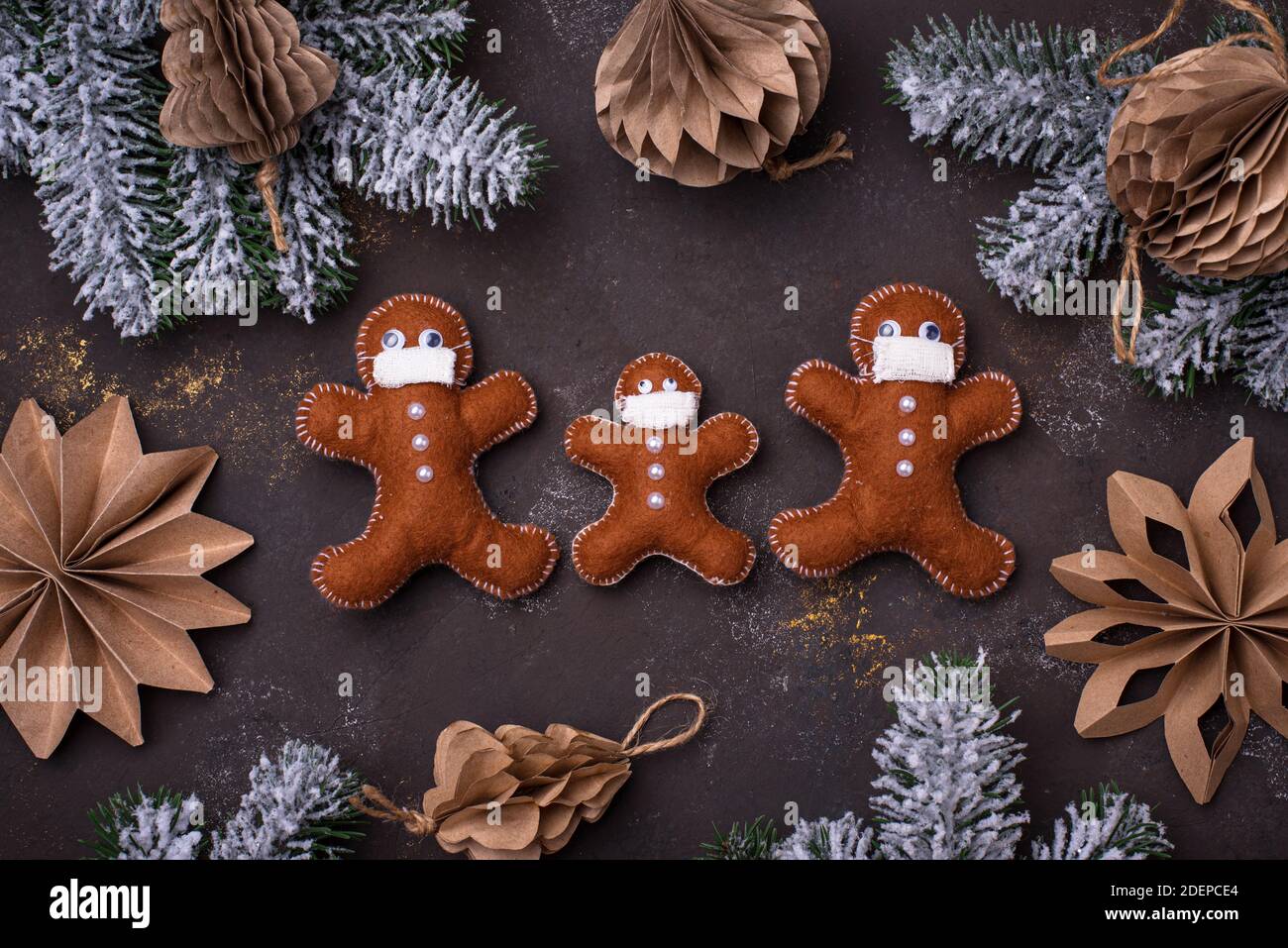 Gingerbread man from felt in face mask Stock Photo - Alamy