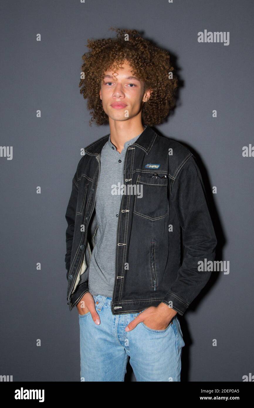 Adam, winner of the french Final pose after the Elite Model Look ...