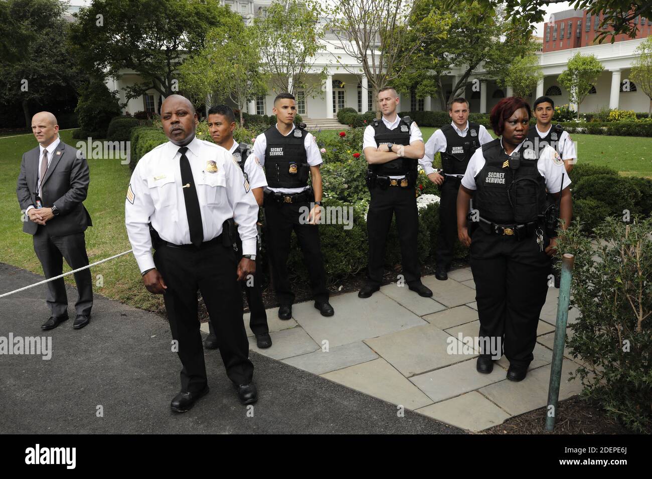 Members of the Secret Service watch as U.S. President Donald Trump ...