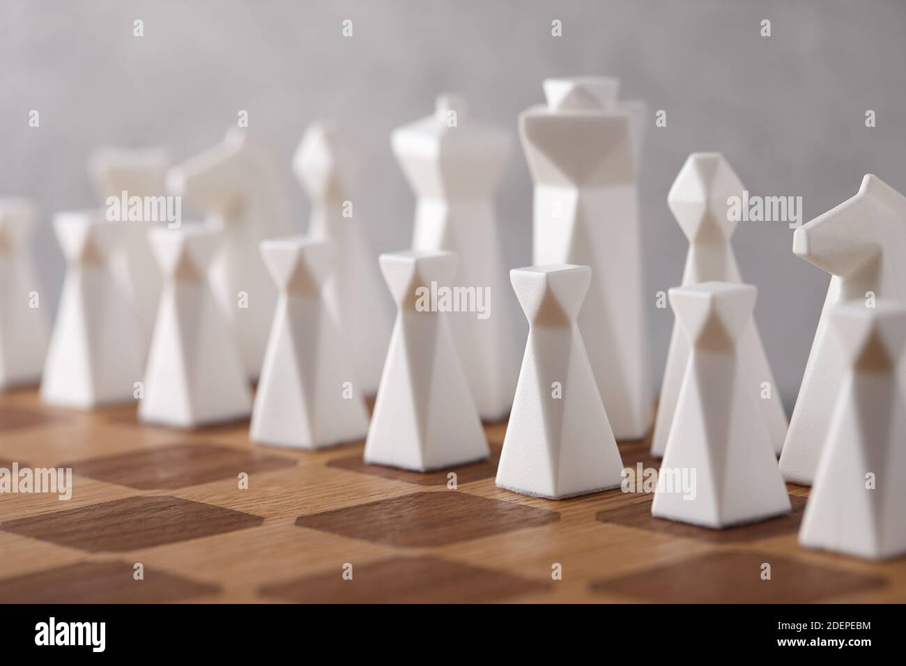Chess board with white pieces. Intellectual competition Stock Photo - Alamy