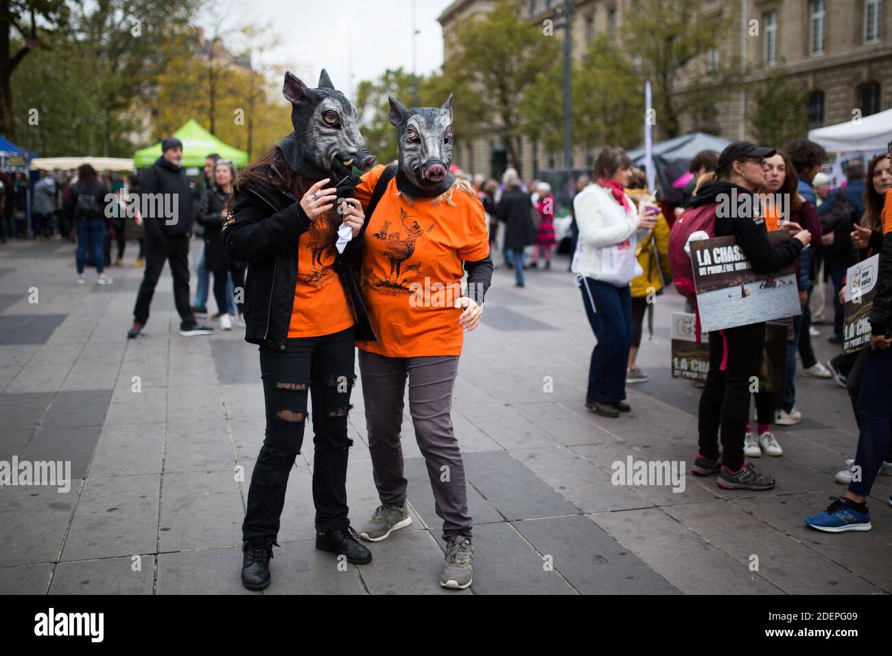 Protesters with masks of boars on the place de la republique. Protest ...