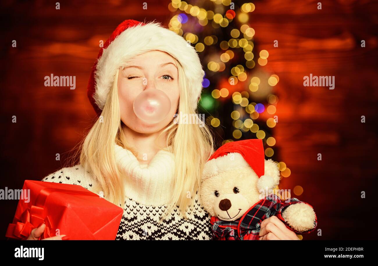 Blow Bubbles with Gum. Only fun on my mind. Girl Santa claus making big ...