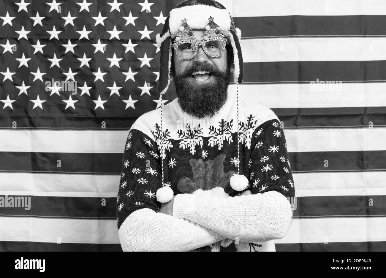 Being Santa can be fun. Bearded man enjoy new year fun. Patriotic ...