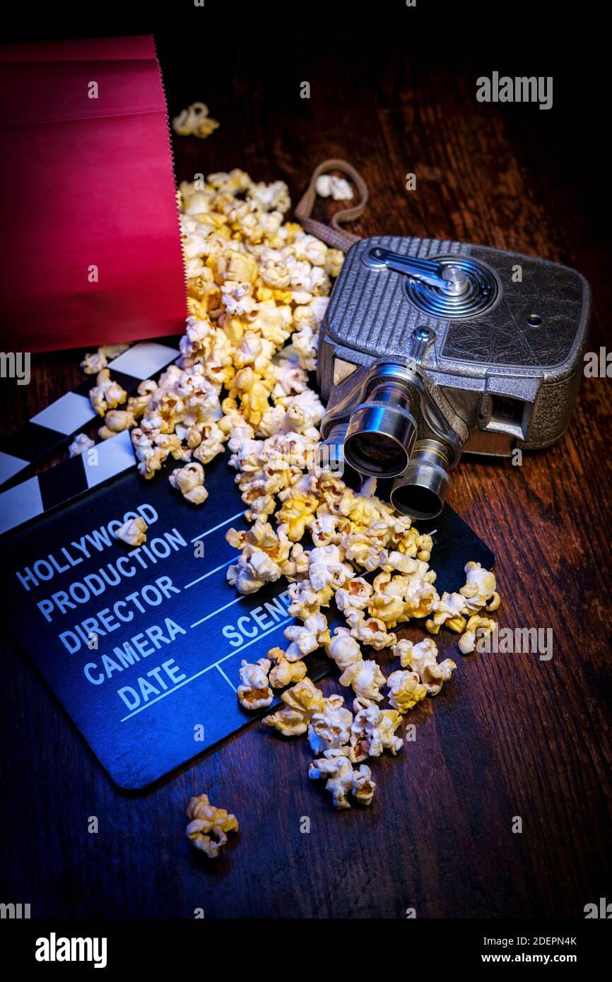 Movie theater popcorn with butter and blue backlighting Stock Photo - Alamy