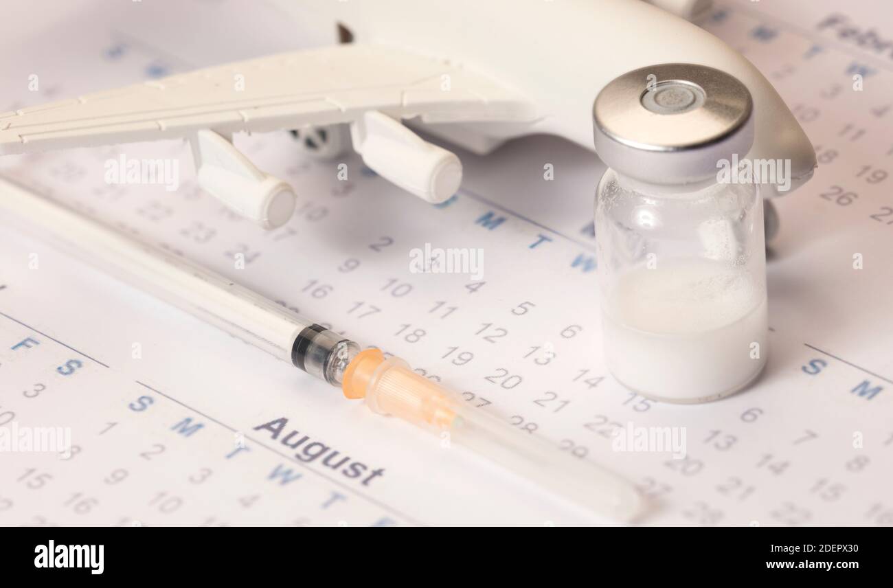 Vaccine vial, syringe, on top of pcr medical form for covid-19 Stock ...