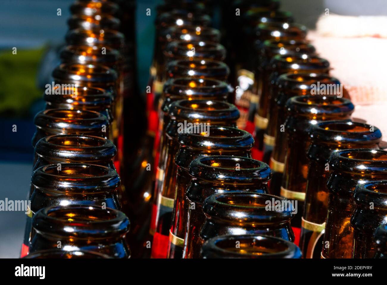 some beer bottles lined up Stock Photo - Alamy