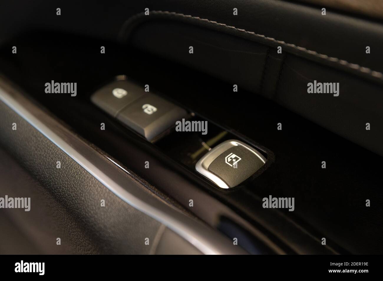 Control panel for electric windows on driver's door, detail of interior ...