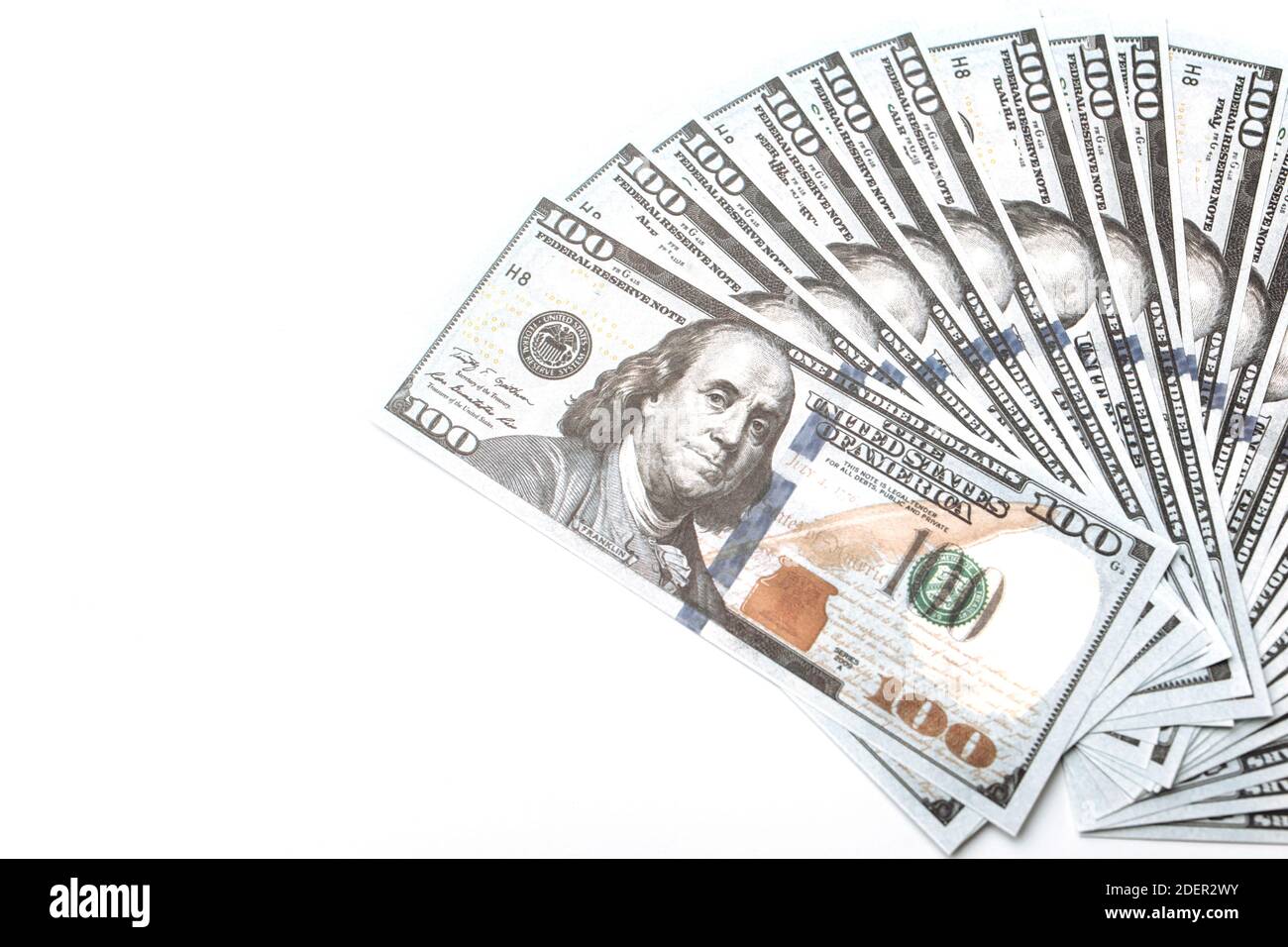 Many bills of 100 dollars, American banknote, white background with ...