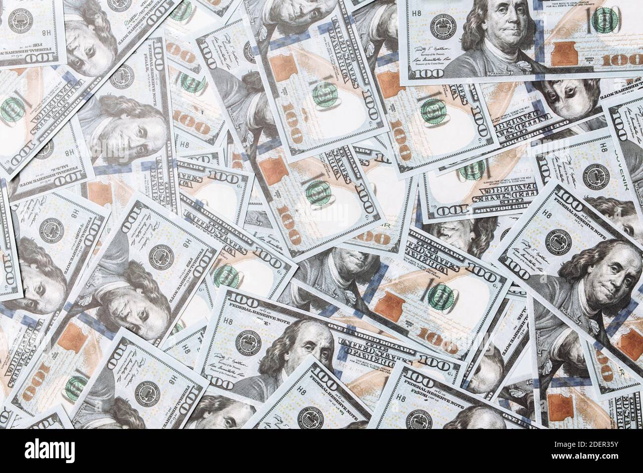 Many bills of 100 dollars, American banknote, background of money, cash ...