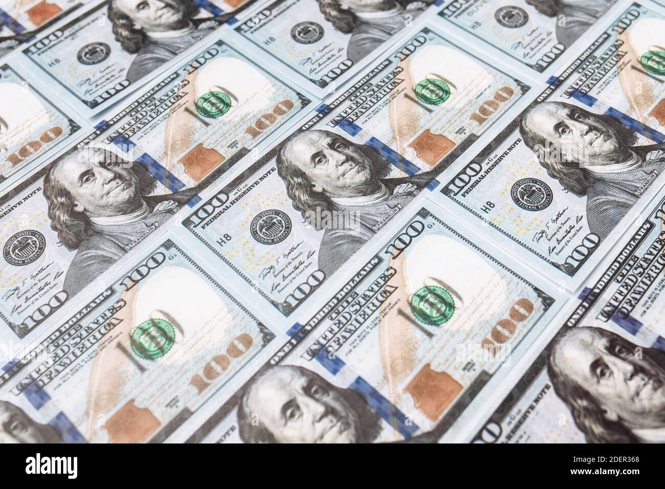 Many bills of 100 dollars, American banknote, background of money, cash ...