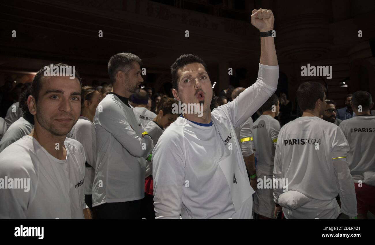 Runners during the presenation of the official logo of the Paris 2024 ...