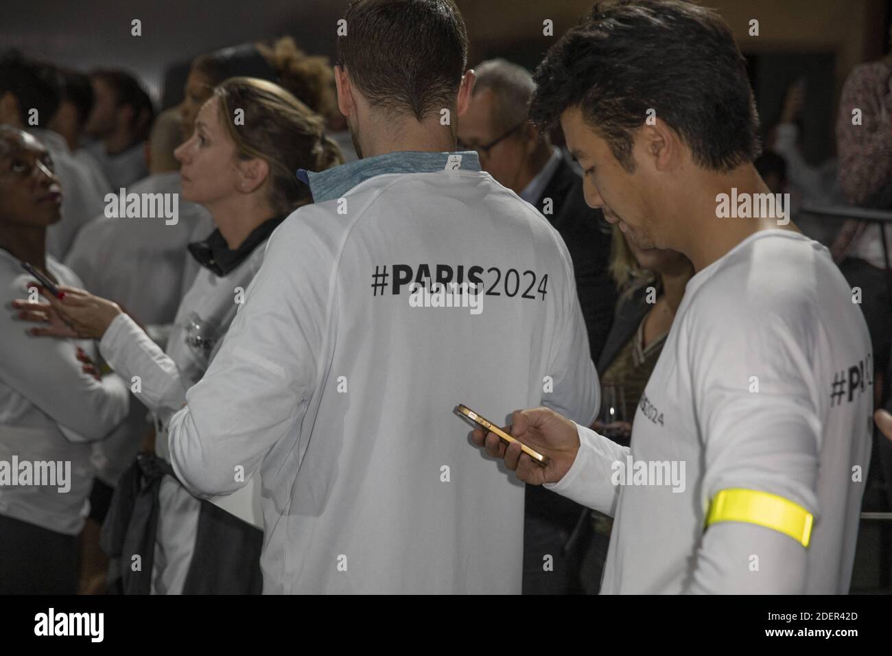 Runners during the presenation of the official logo of the Paris 2024 ...