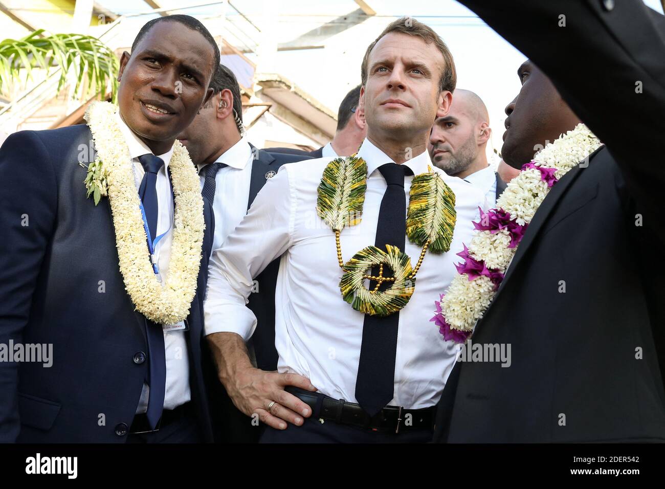 French President Emmanuel Macron visiting Hamjago and talking with ...
