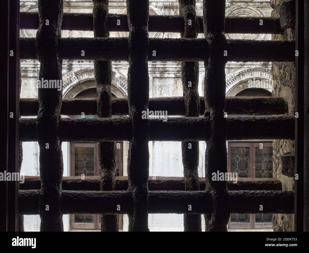 View trough iron grills of Circolo Artistico, the former prisons ...