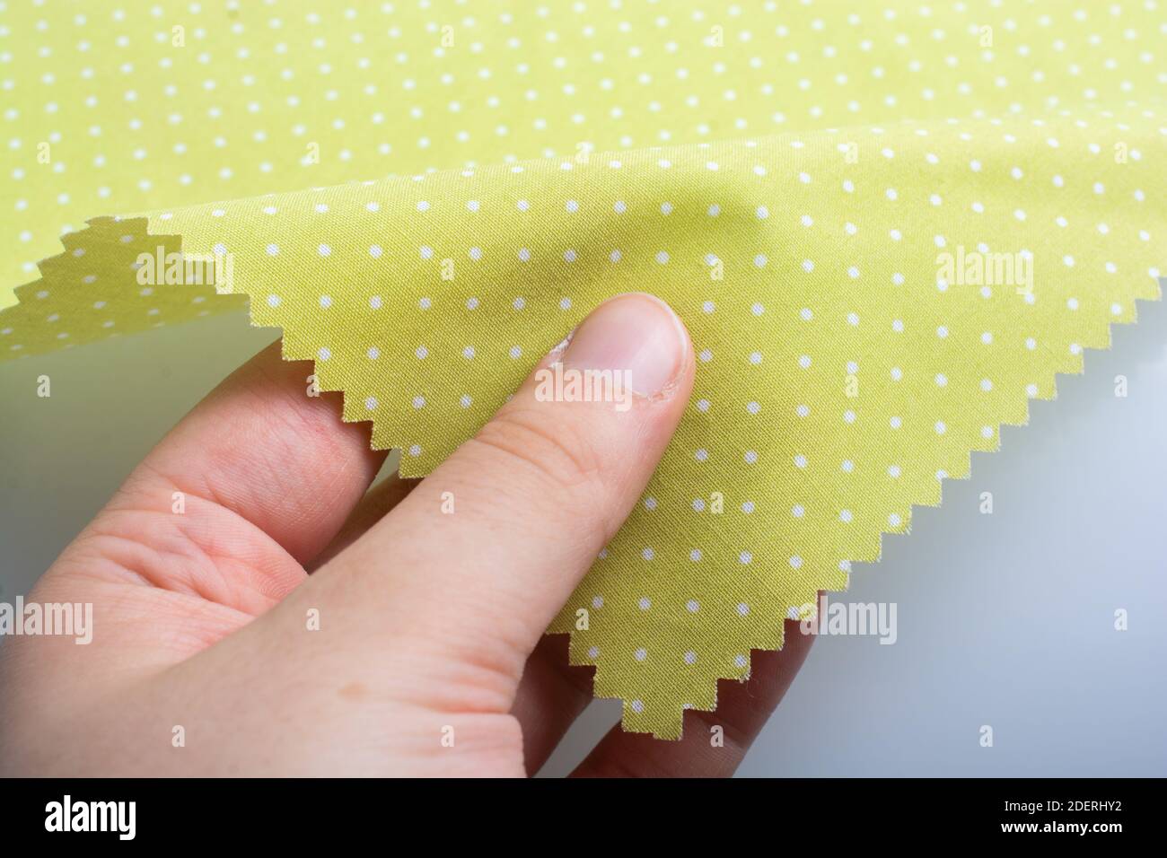 Finger touching cloth hi-res stock photography and images - Alamy