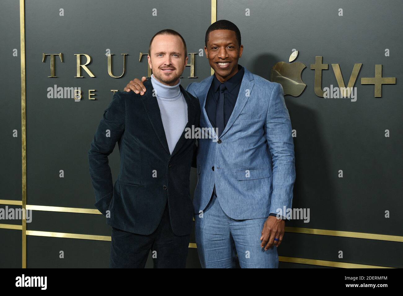 Aaron Paul and Ray Stoney attend the premiere Of Apple TV+'s "Truth Be ...