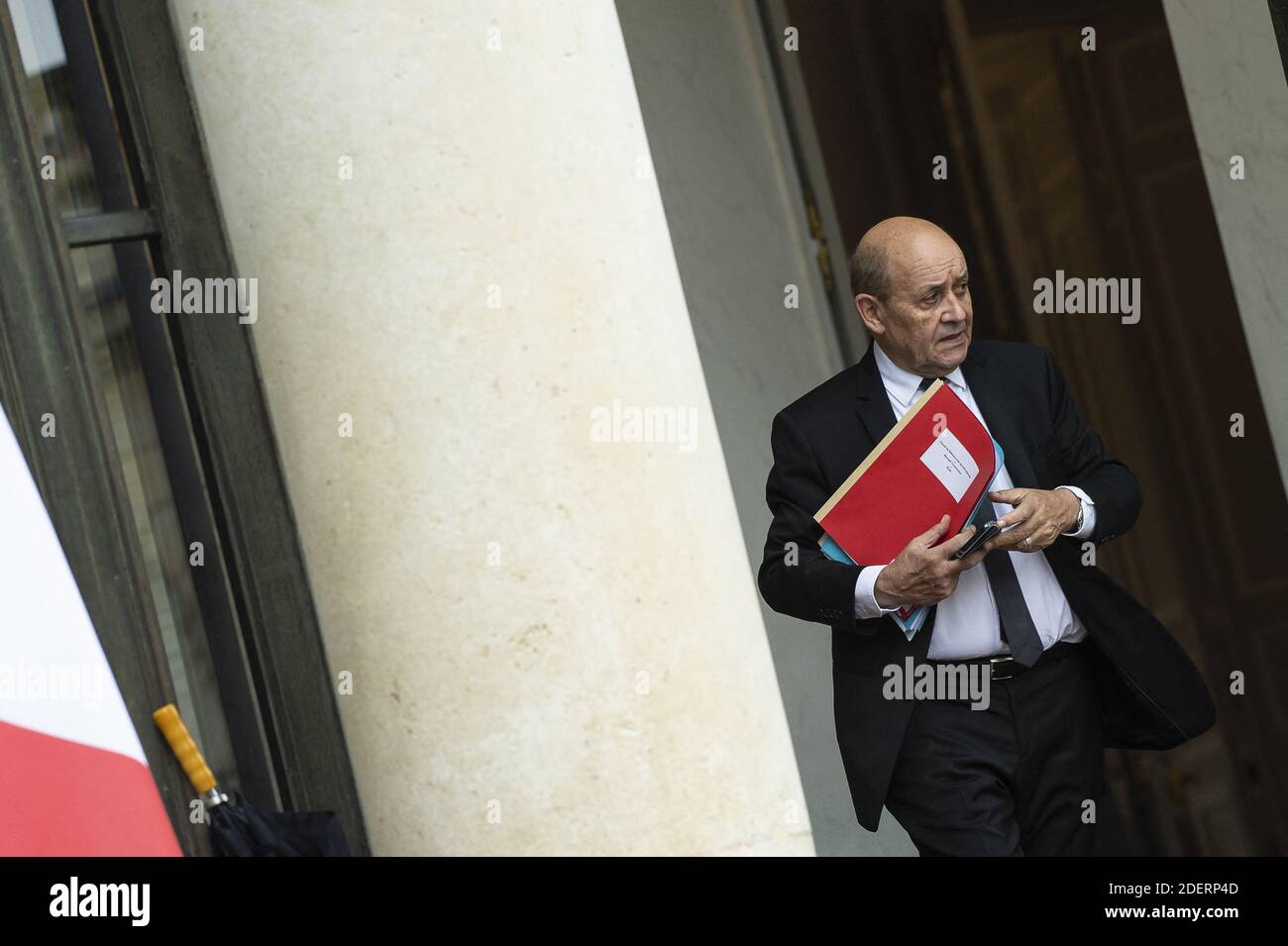 French Foreign Affairs Minister Jean-Yves Le Drian leaves the Elysee ...