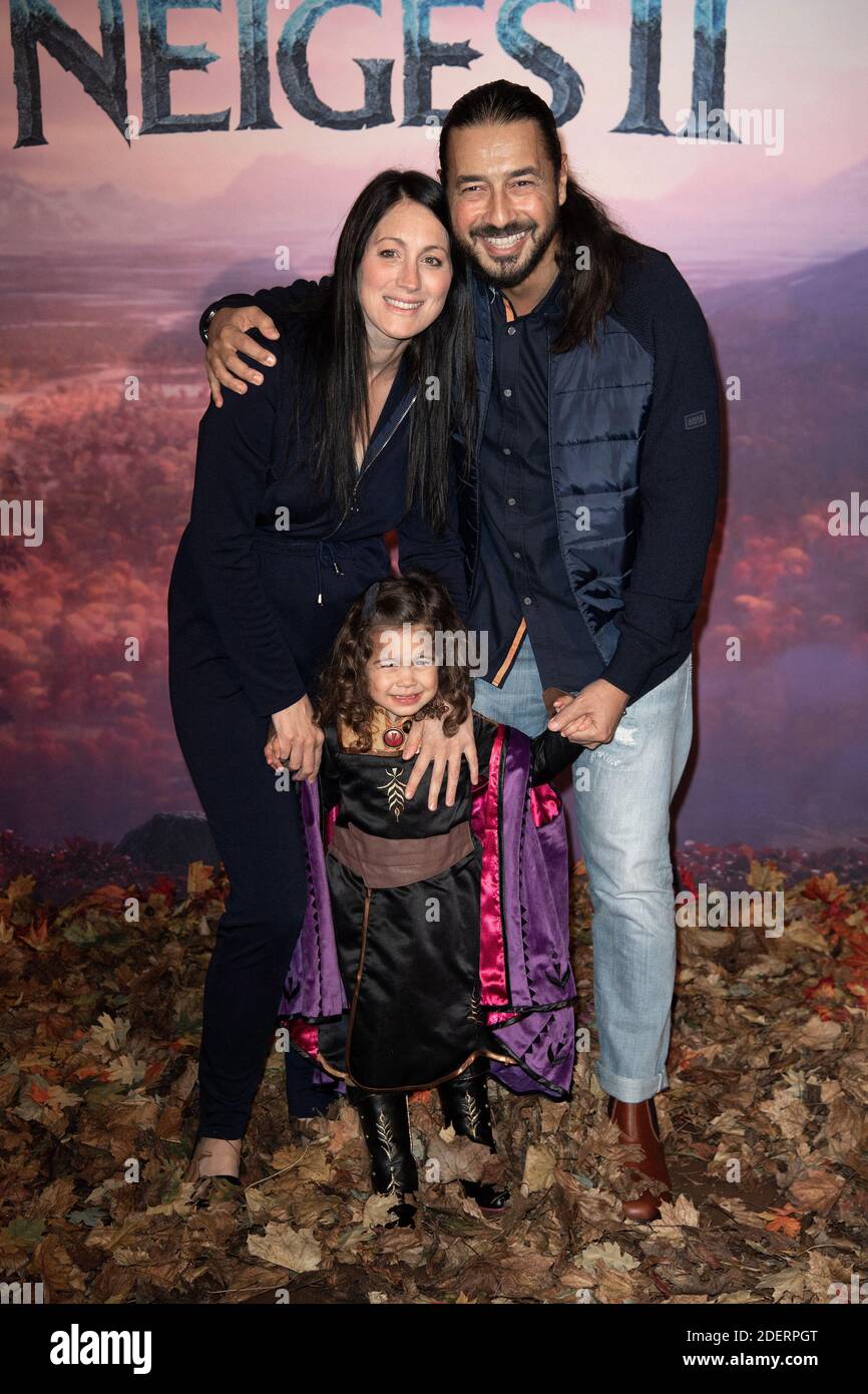 Moundir, his wife Ines and their daughter Alya attend "Frozen 2" Paris ...