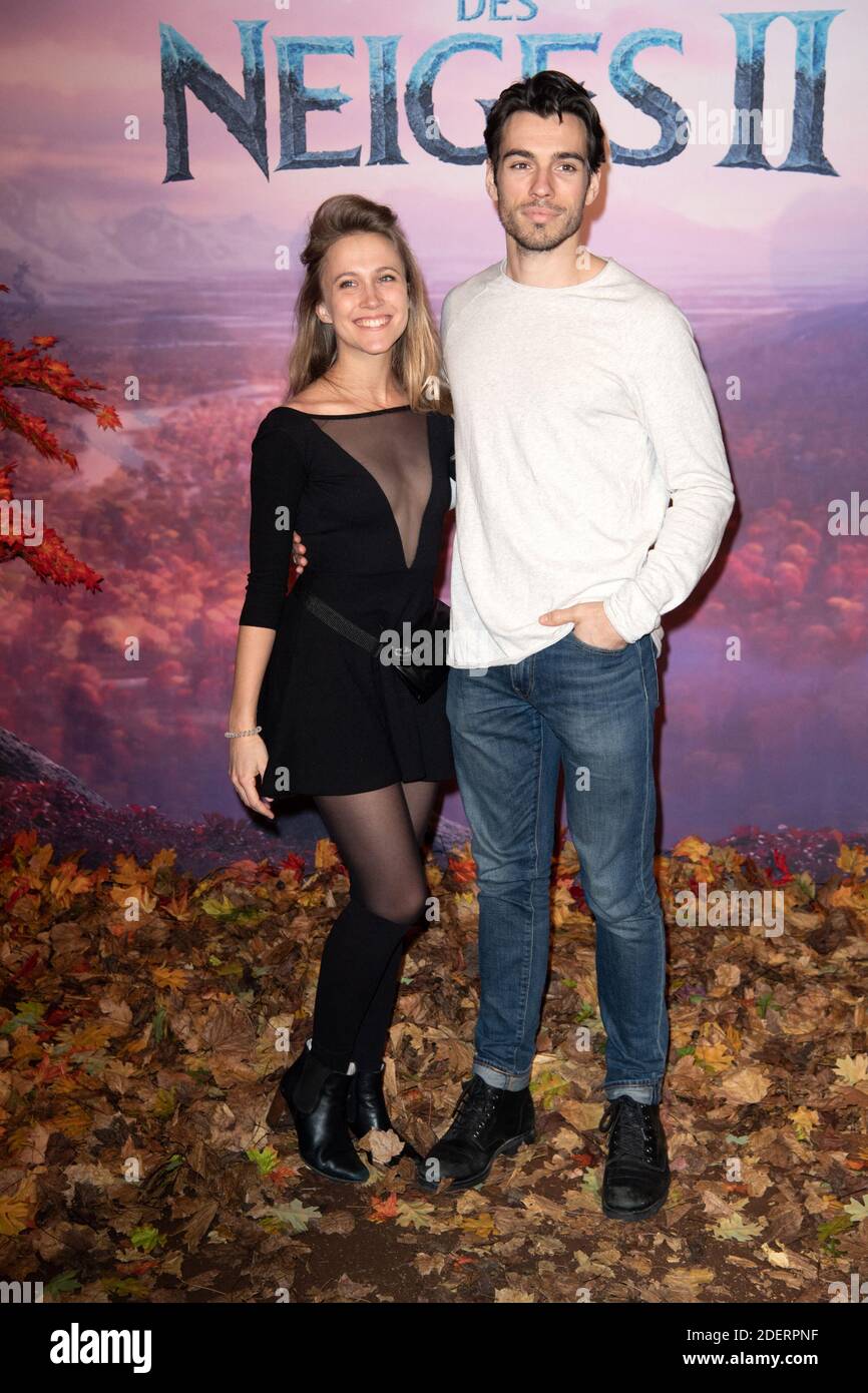 Alexis Loizon (R) and a guest attend âÂ€Â˜Frozen 2 - La Reine Des ...