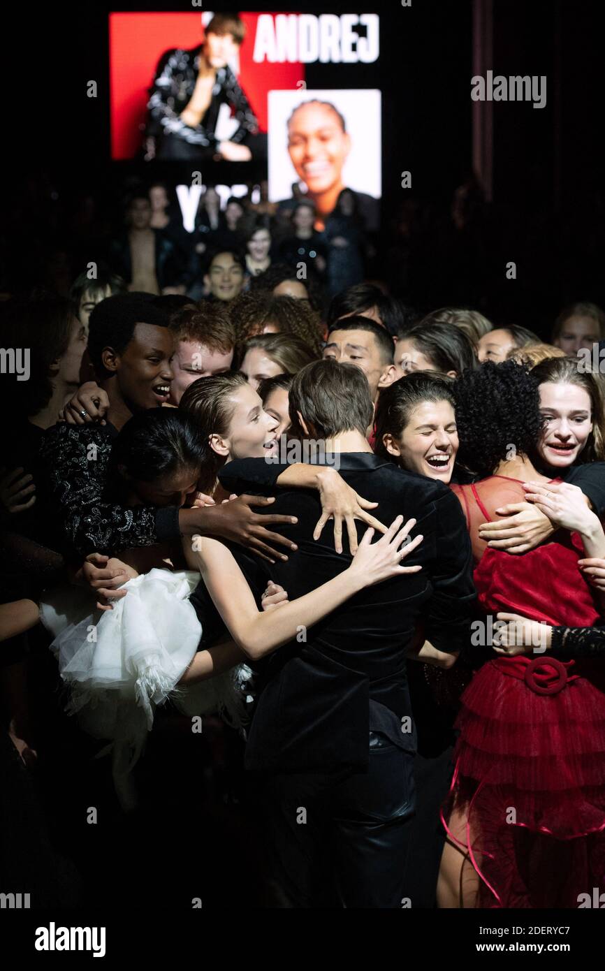 Winners, Andrej Chamula and Yireh Fernanda hug on the runway during the ...