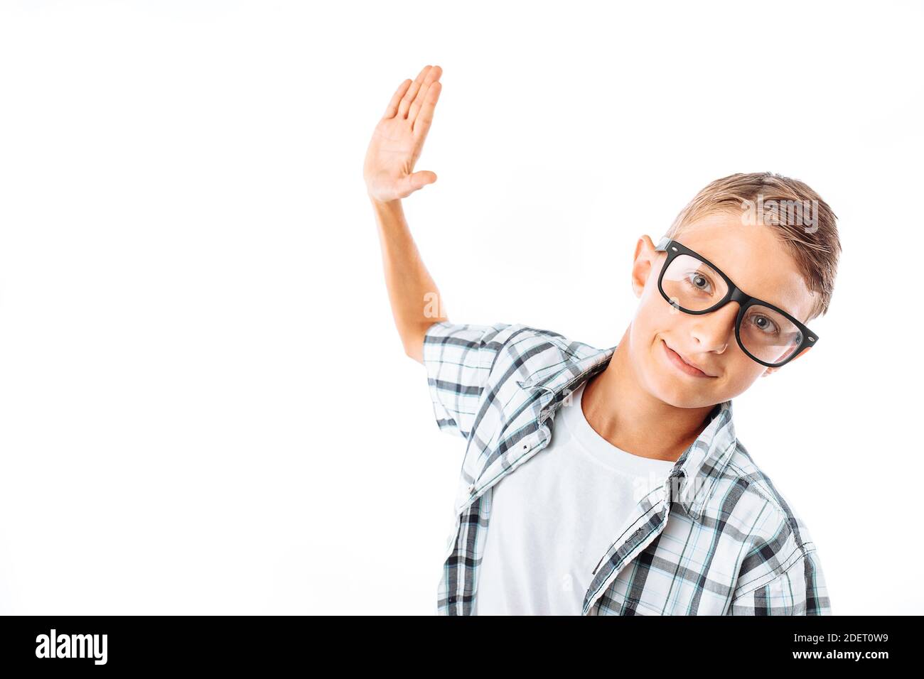 Young handsome man in glasses swinging his hand to give five, nerd in ...
