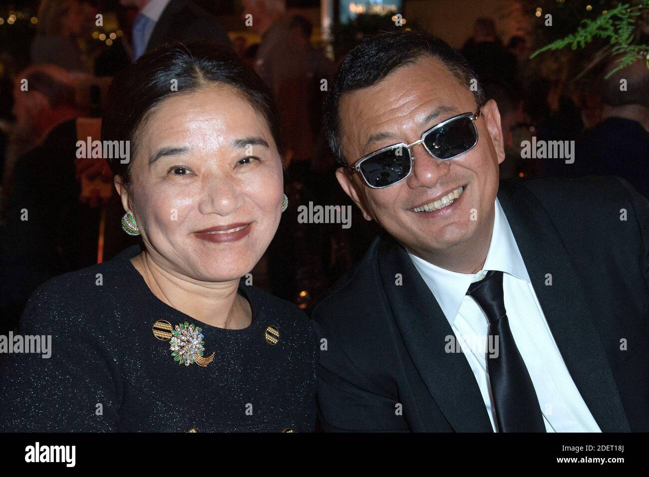 Director Wong Kar-Wai and his wife Ye-cheng Chan attending the Grand Dinner of the Louvre ...