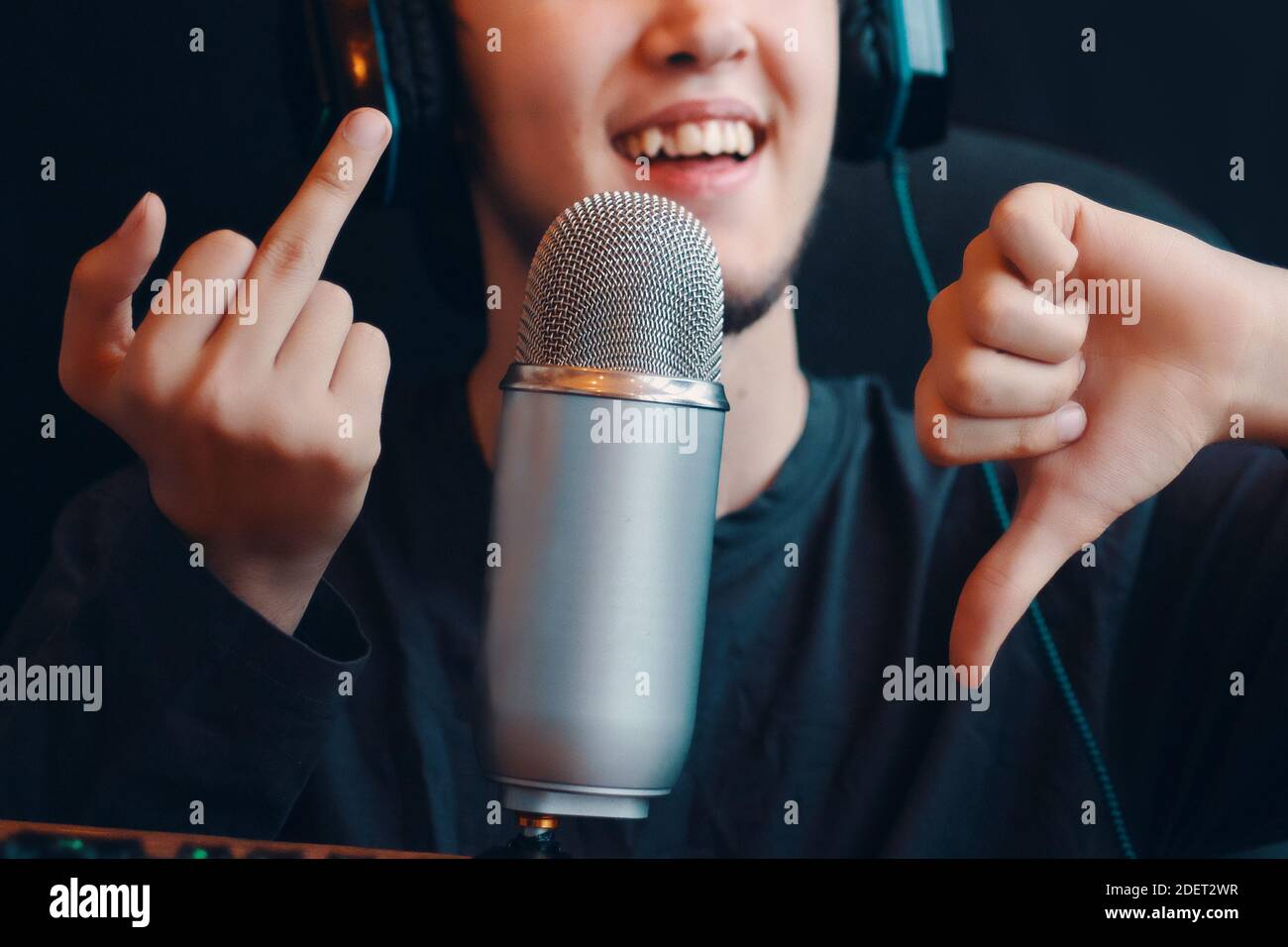 Streamer show gestures. Gamer dislike videogame. Gesture of disapproval ...