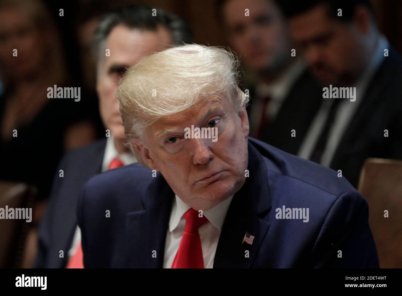 U.S. President Donald Trump listens to debates during a meeting on ...