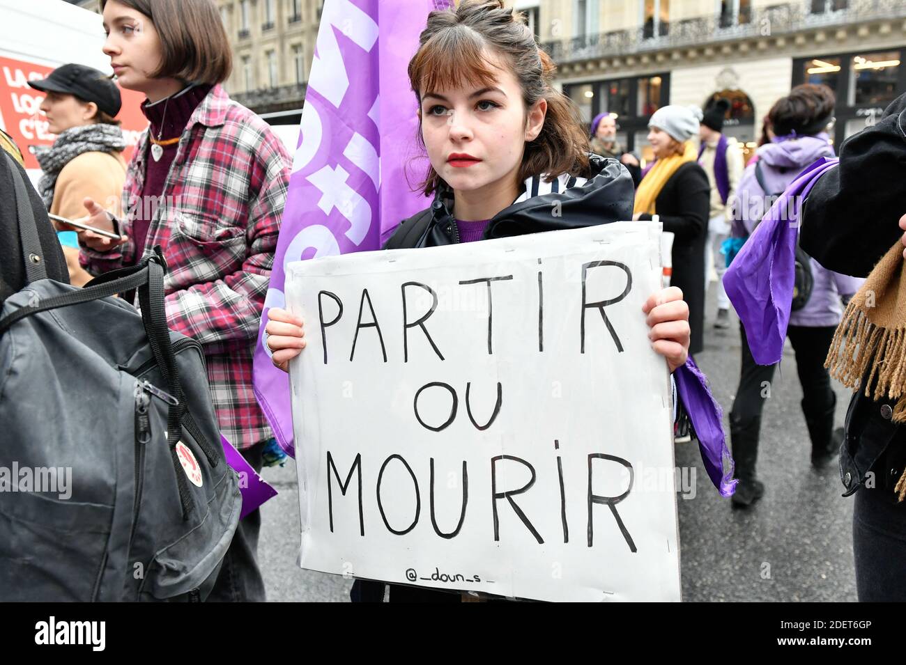 People take part in a protest during the International day for ...