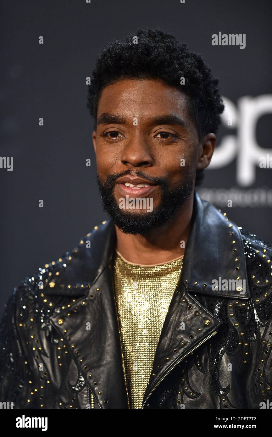 Chadwick Boseman poses in the press room during the 2019 American Music ...