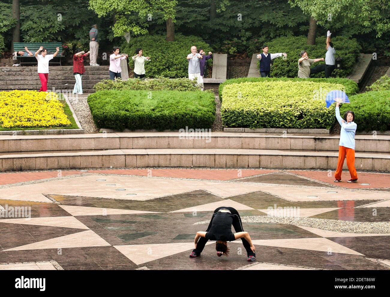 Early morning exercise in Kai Qiao Greenland park in the Chang Ning ...