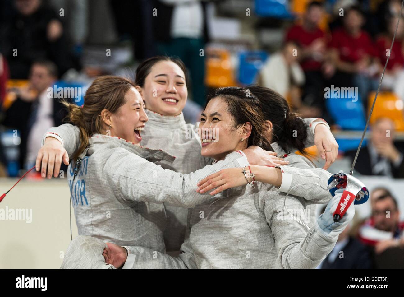 Jiyeon Kim (C.) alongside her teammates Sooyeon Choi, Jisu Yoon and ...