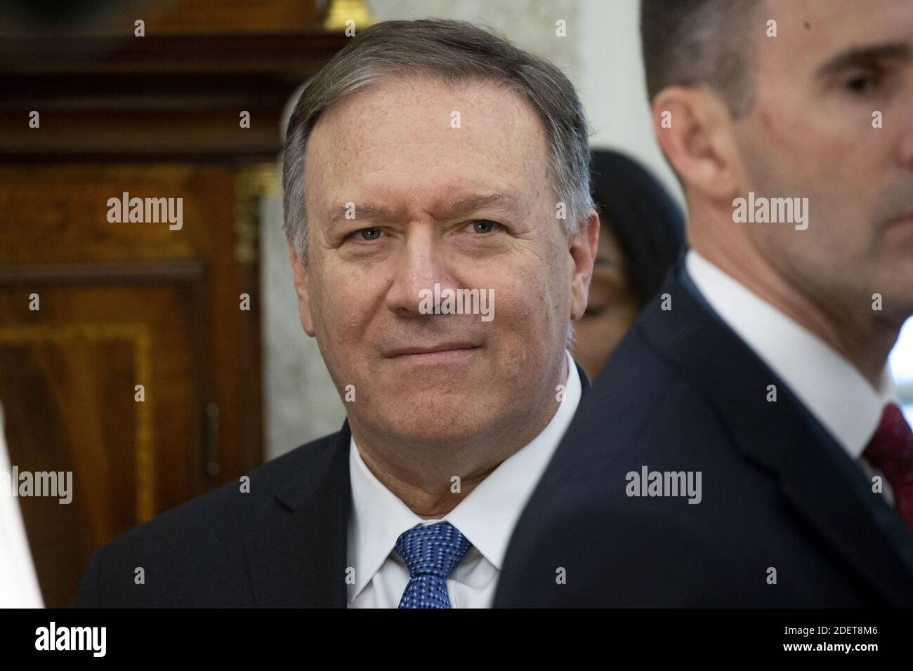 US Secretary of State Mike Pompeo stands in the Oval Office during the ...