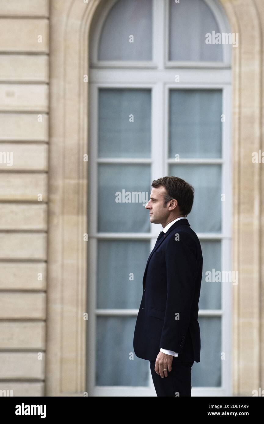 French President Emmanuel Macron gestures at the Elysee palace in Paris ...