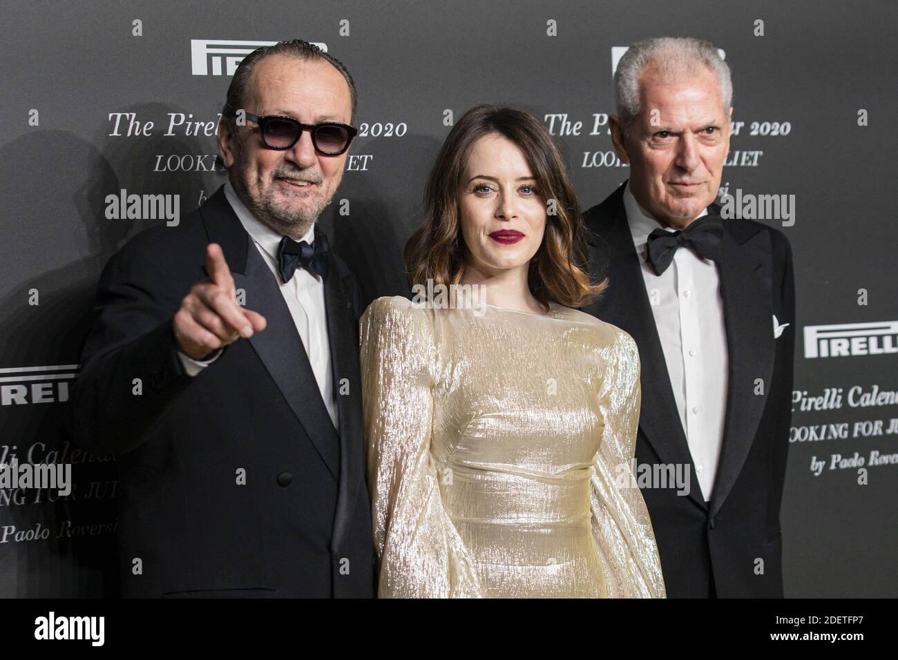 Claire Foy , Paolo Roversi and Marco Tronchetti Provera attend the ...