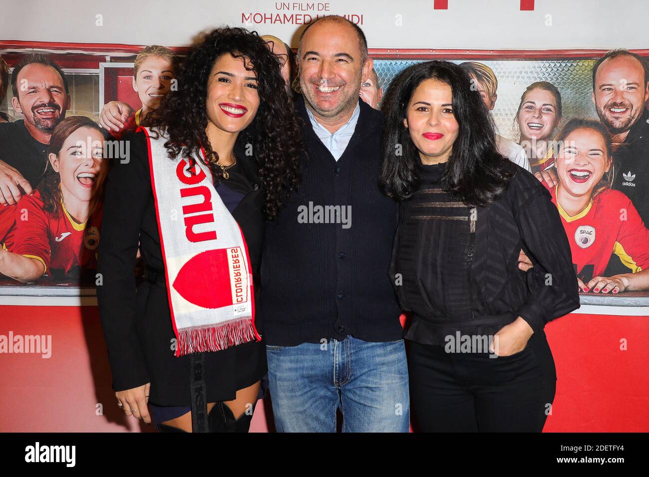 Sabrina Ouazani, Director Mohamed Hamidi and his wife attending Une ...