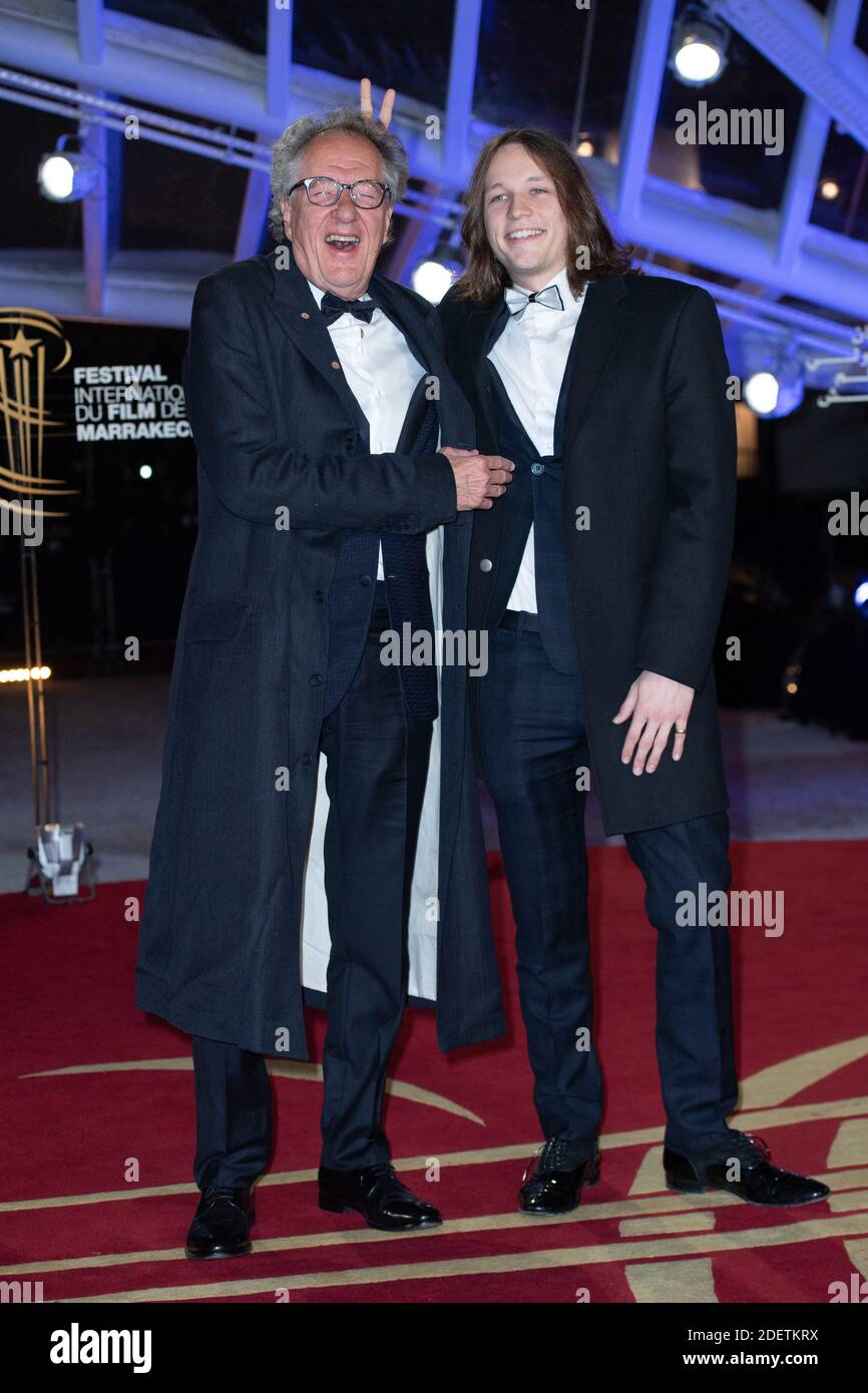 Geoffrey Rush and his son attending the Closing Ceremony Red Carpet ...