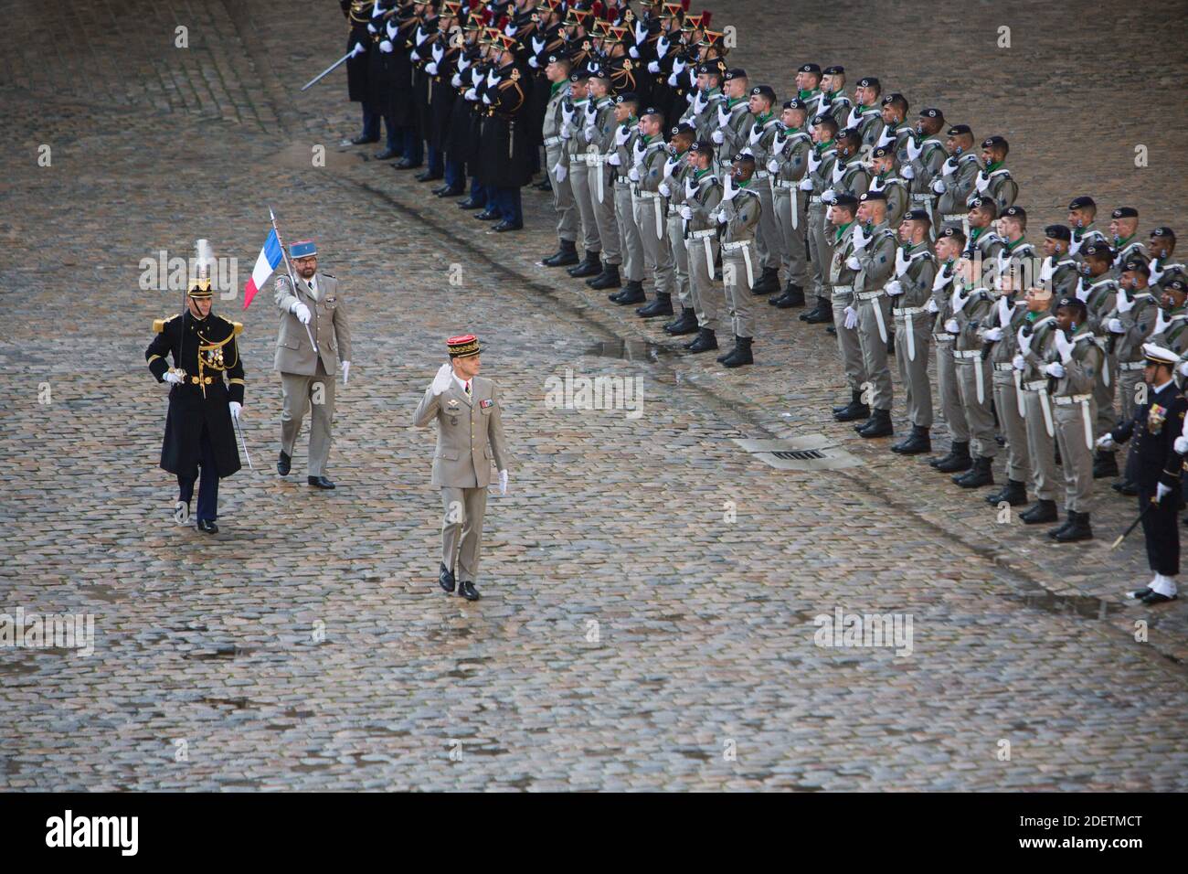 French General Bruno Le Ray salute troops during the award ceremony at ...