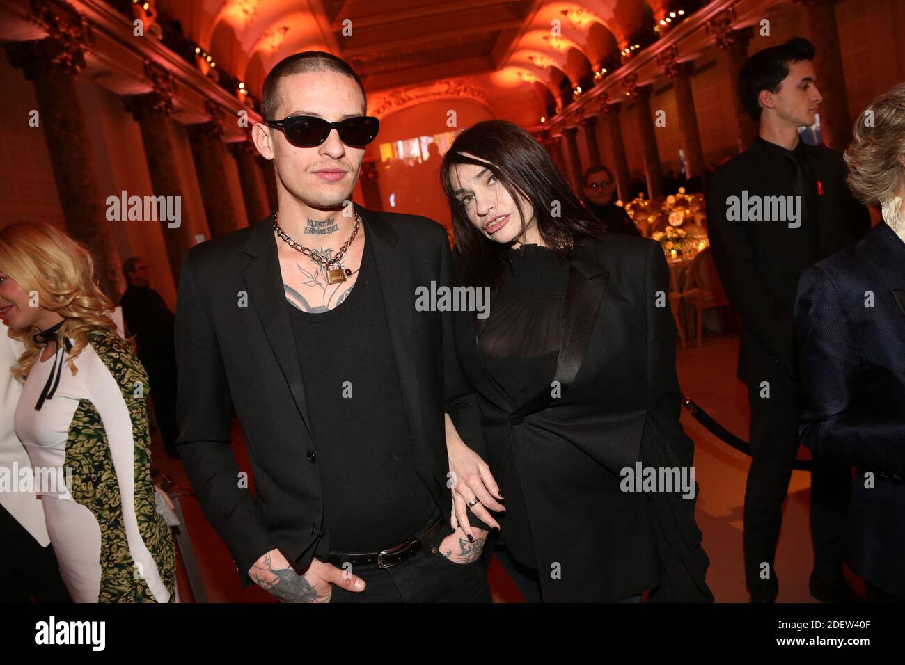 Beatrice Dalle and a guest at 18th "Diner de la mode", "Sidaction ...