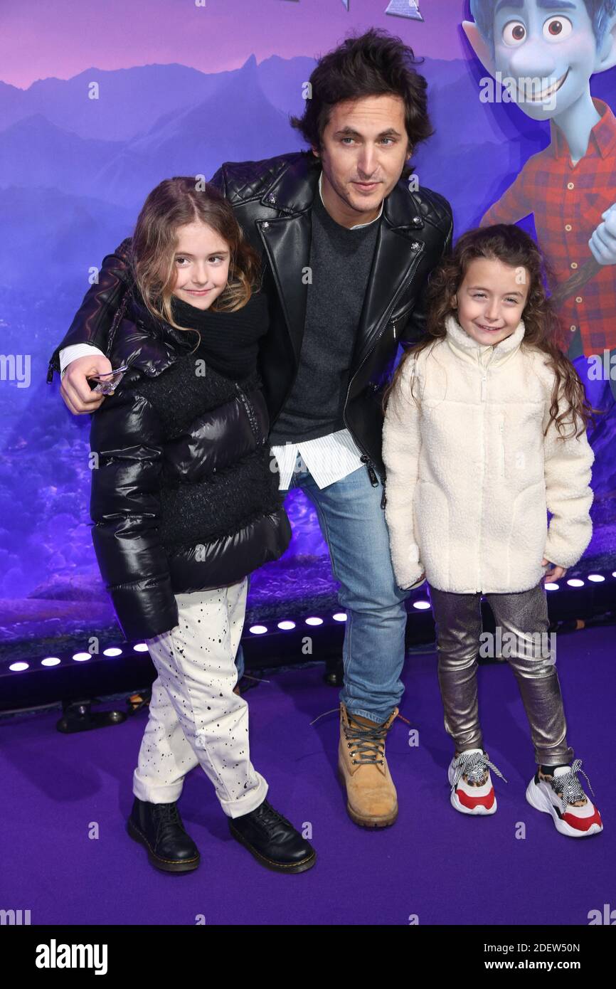 Mickael Miro and his daughters attending the premiere of 'En Avant ...