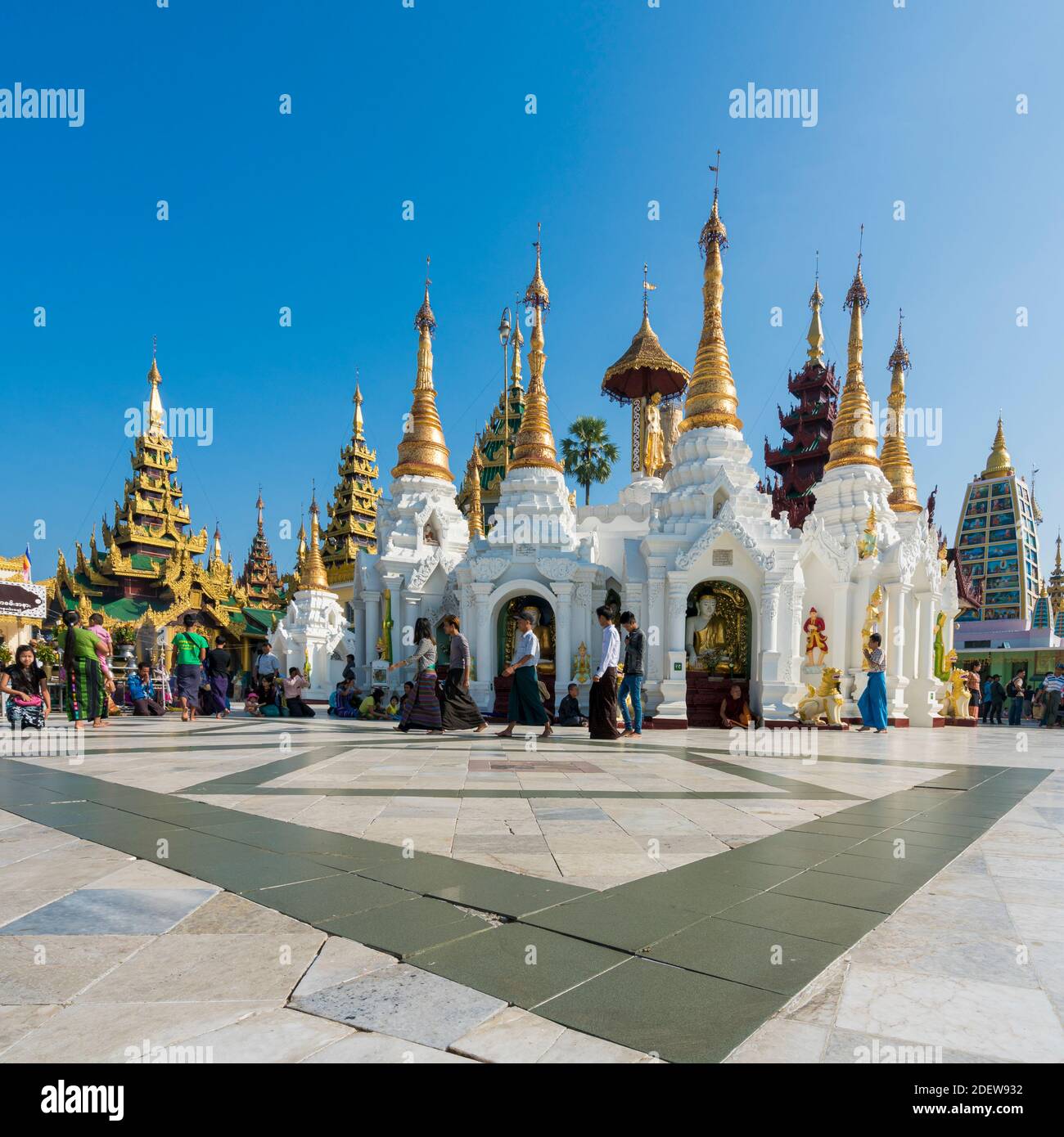 White Buddhist temple at Shwedagon Pagoda complex, Yangon, Myanmar ...