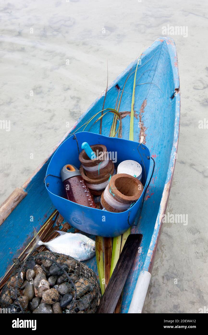 wooden little fisher boat with caught tropical fish Stock Photo - Alamy