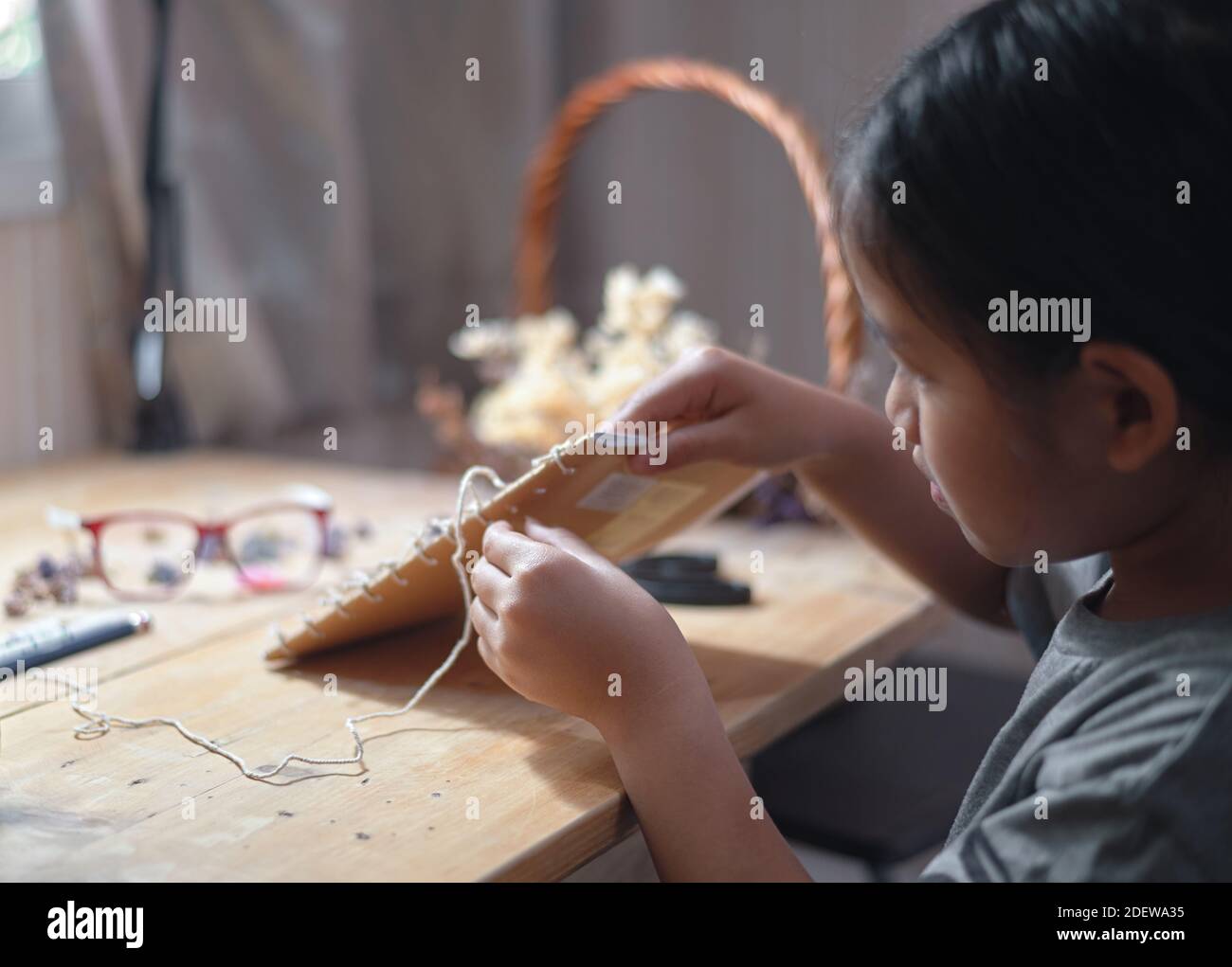 Kid making book hi-res stock photography and images - Alamy