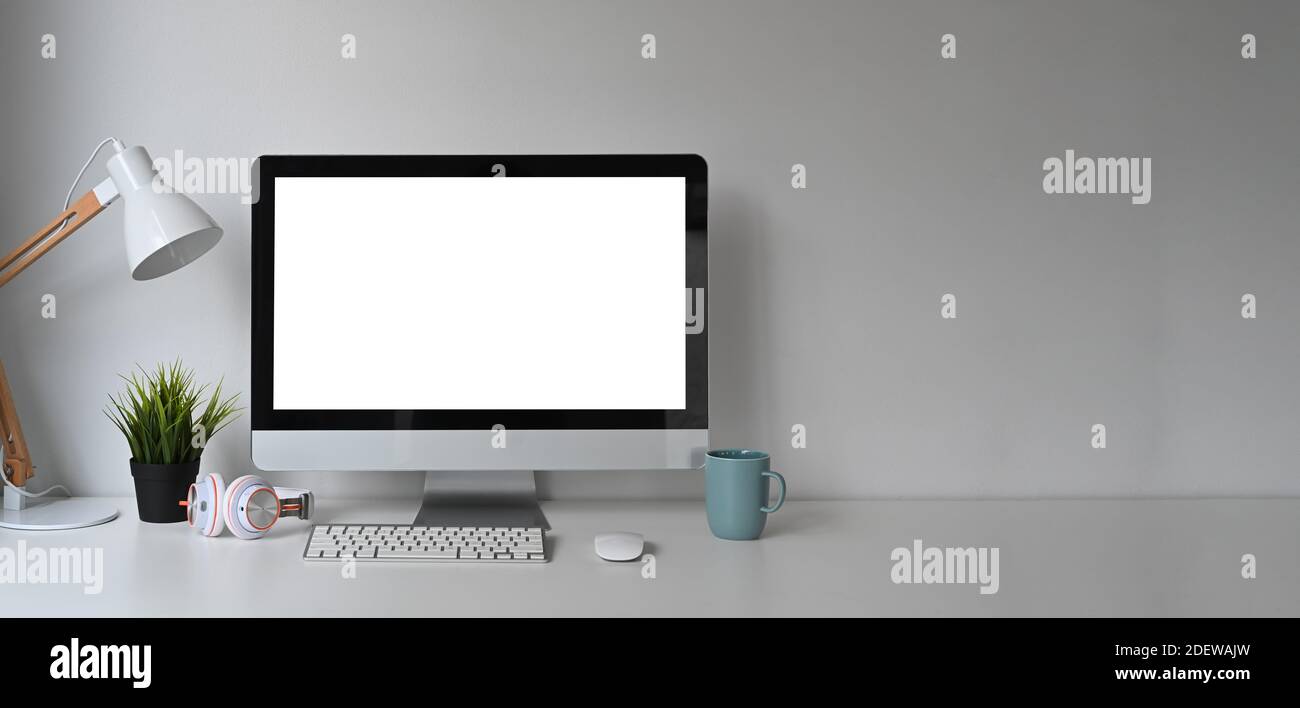 Mockup image of blank screen desktop computer, office supplies and ...