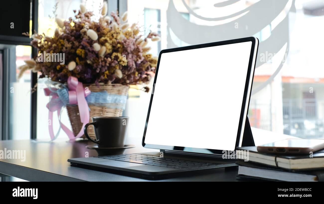 Modern workspace with isolated white display computer tablet and office ...