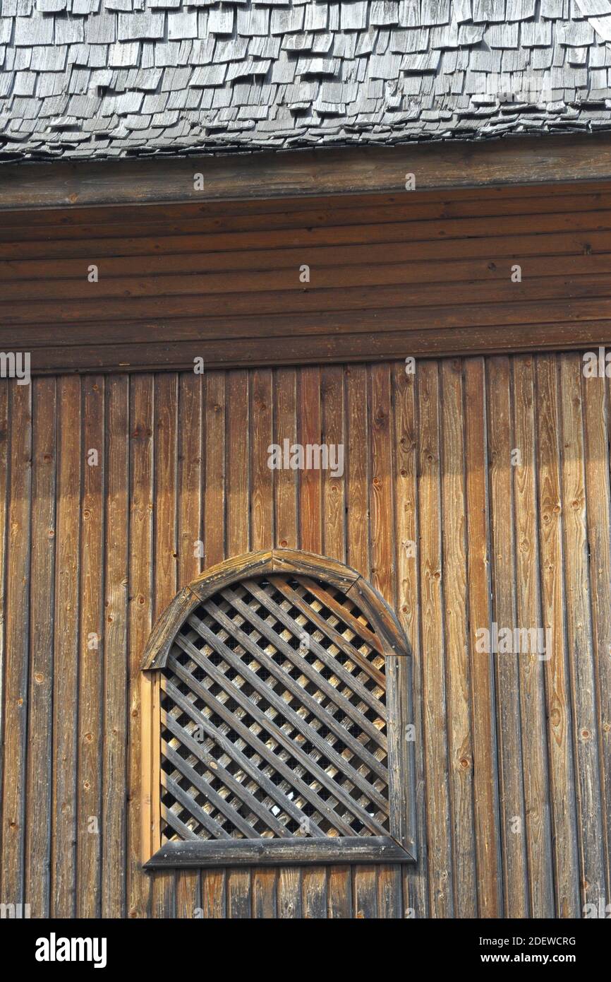a small wooden window in an old wooden house on the countryside Stock ...