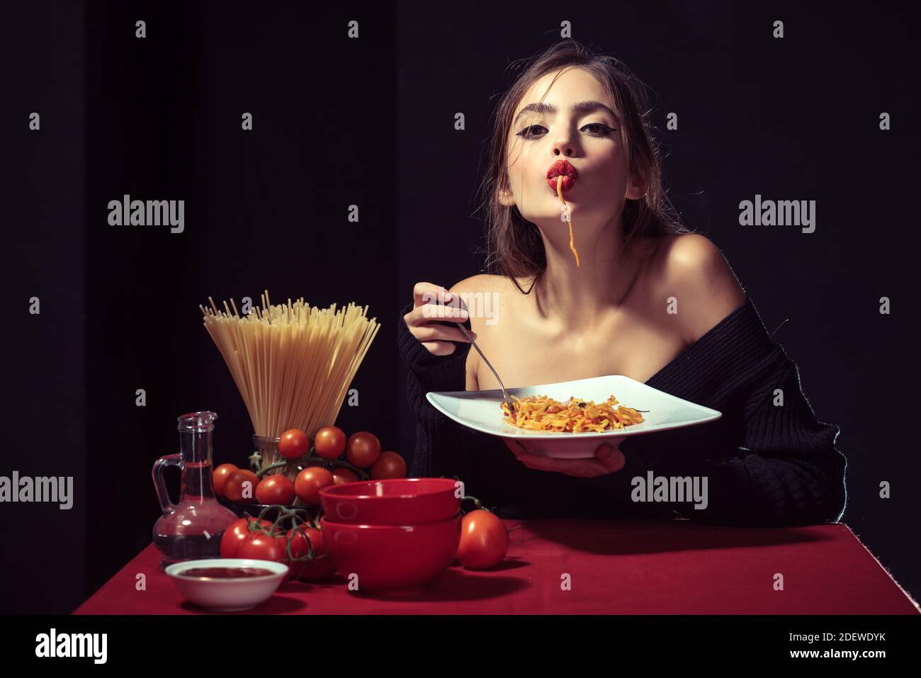 Sensual woman eat spaghetti. Italian girl eats spaghetti pasta Stock ...