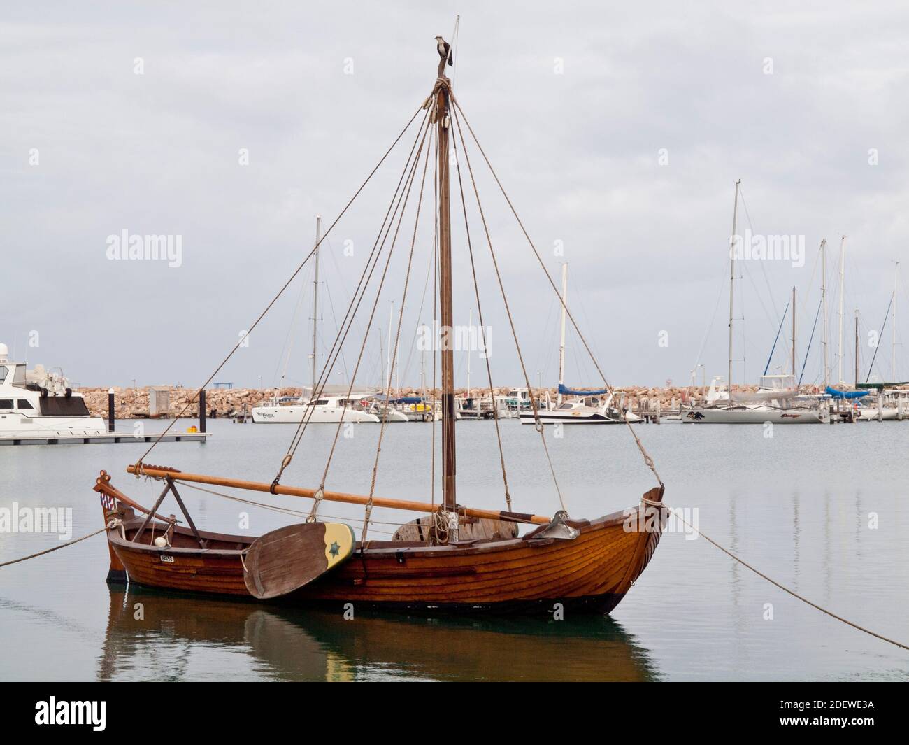 Replica of the Batavia's longboat complete with perched Osprey (Pandion ...