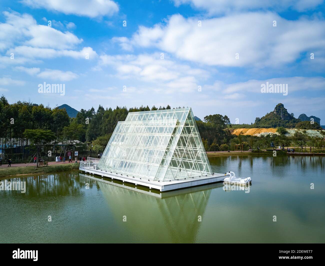Glass house triangle church by the lake Stock Photo - Alamy